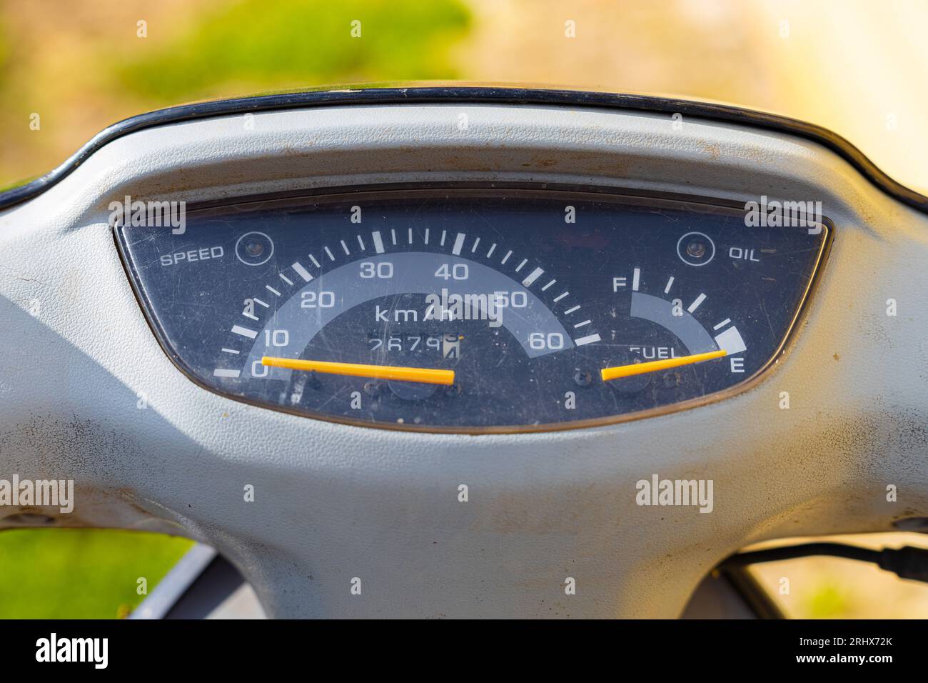 dashboard with speedometer on an old scooter close-up. speedometer on ...