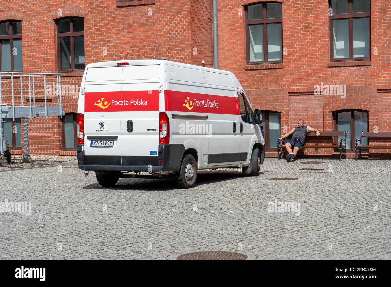 Polish post office van car on the street. Poczta Polska sign. Warsaw ...