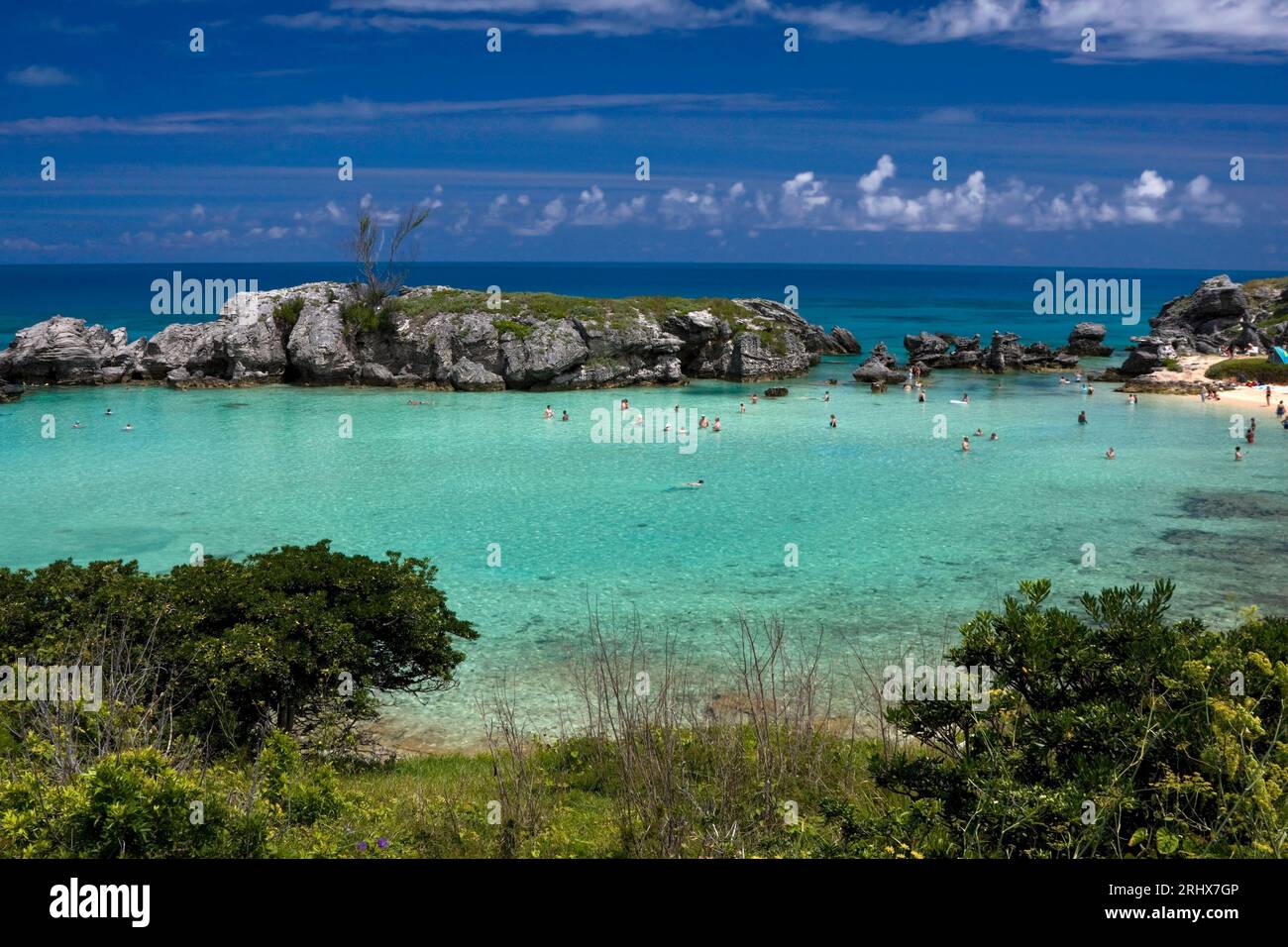Tobacco Bay, clear aqua water, offshore volcanic rock formations ...