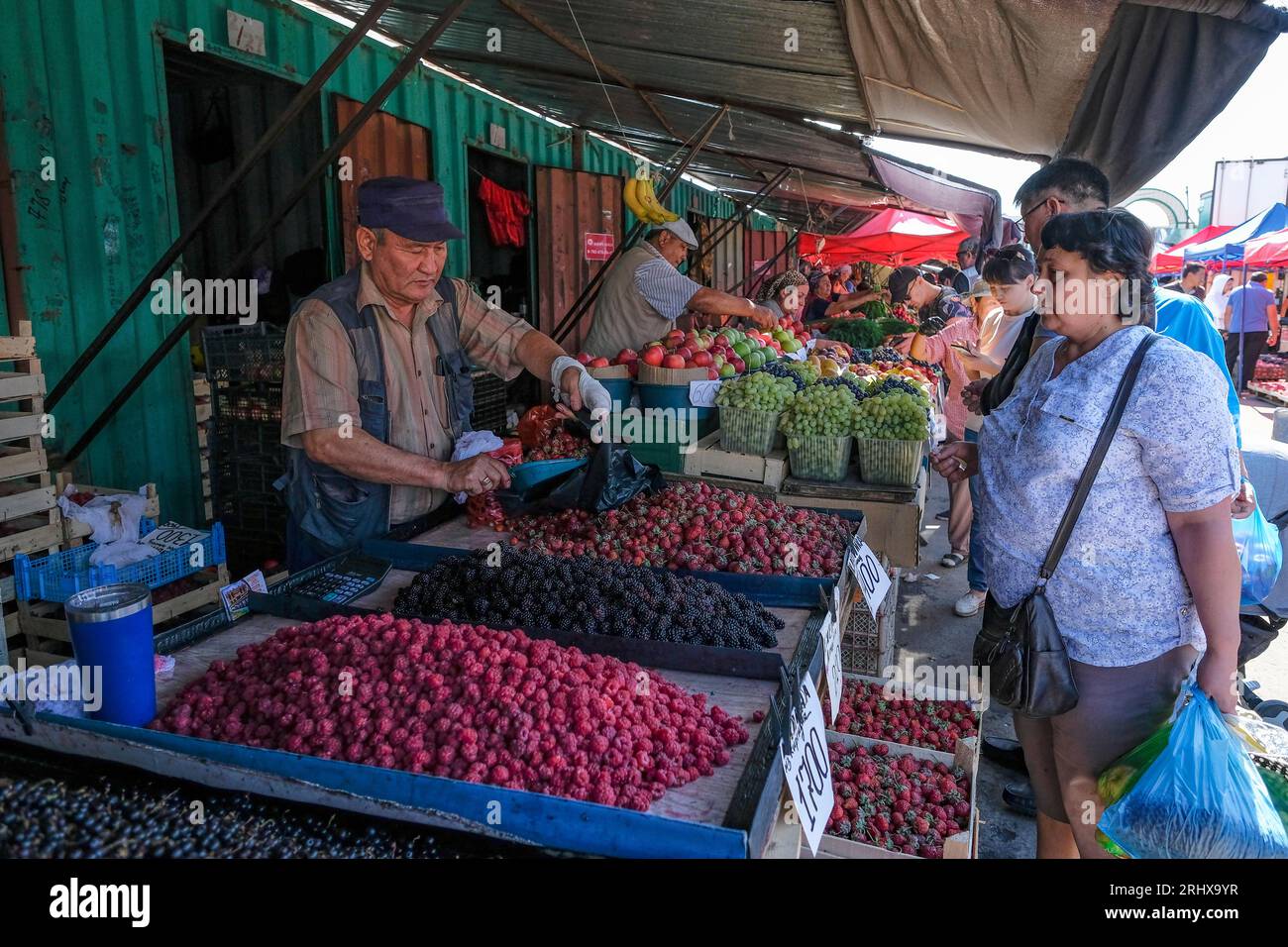 Karaganda, Kazakhstan - August 18, 2023: A strawberry and blackberry ...