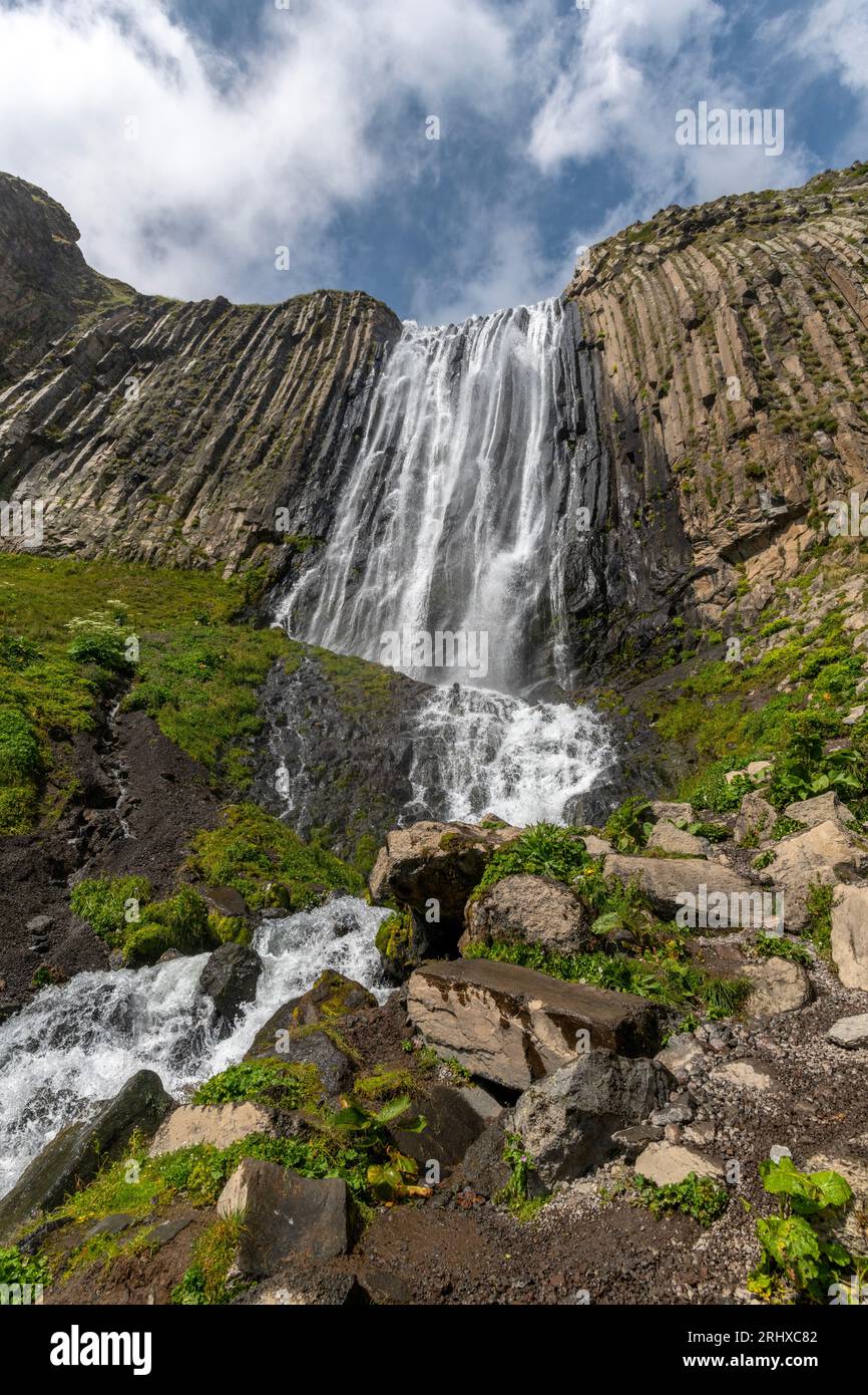Beautiful photo with a mountain waterfall Stock Photo - Alamy