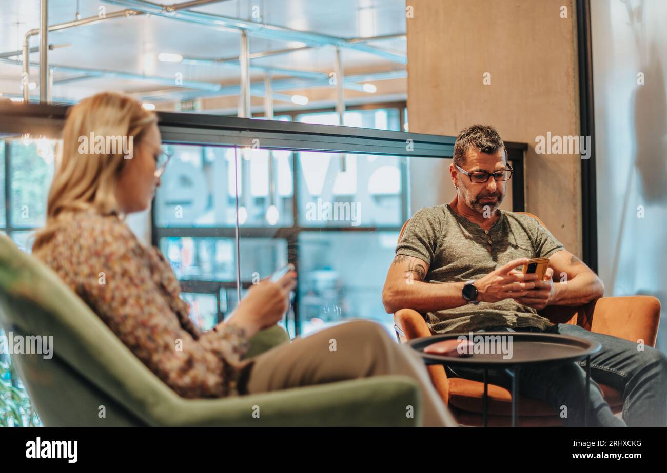 Business couple relaxing at work, no computers, no paperwork, stress ...