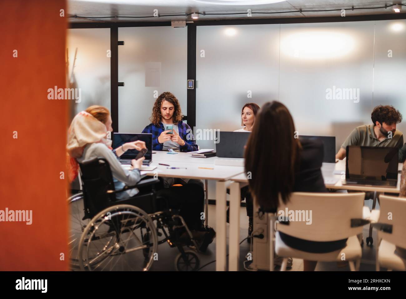 Multicultural business team working together in a good atmosphere ...