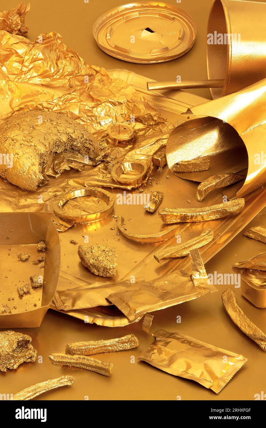Golden street food spread on a table against a golden background Stock ...