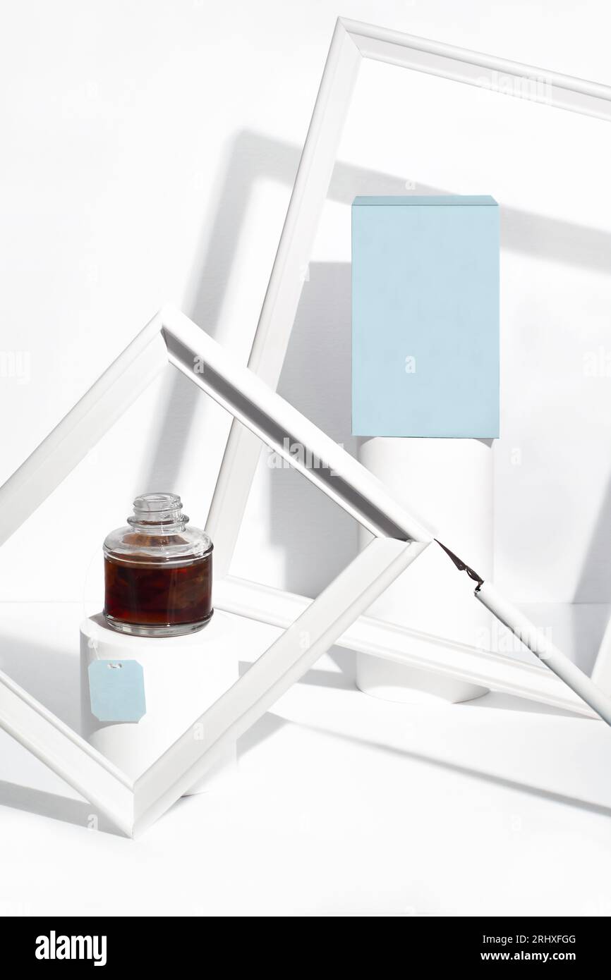 Balancing composition with a blue tea box, a white envelop and a ...