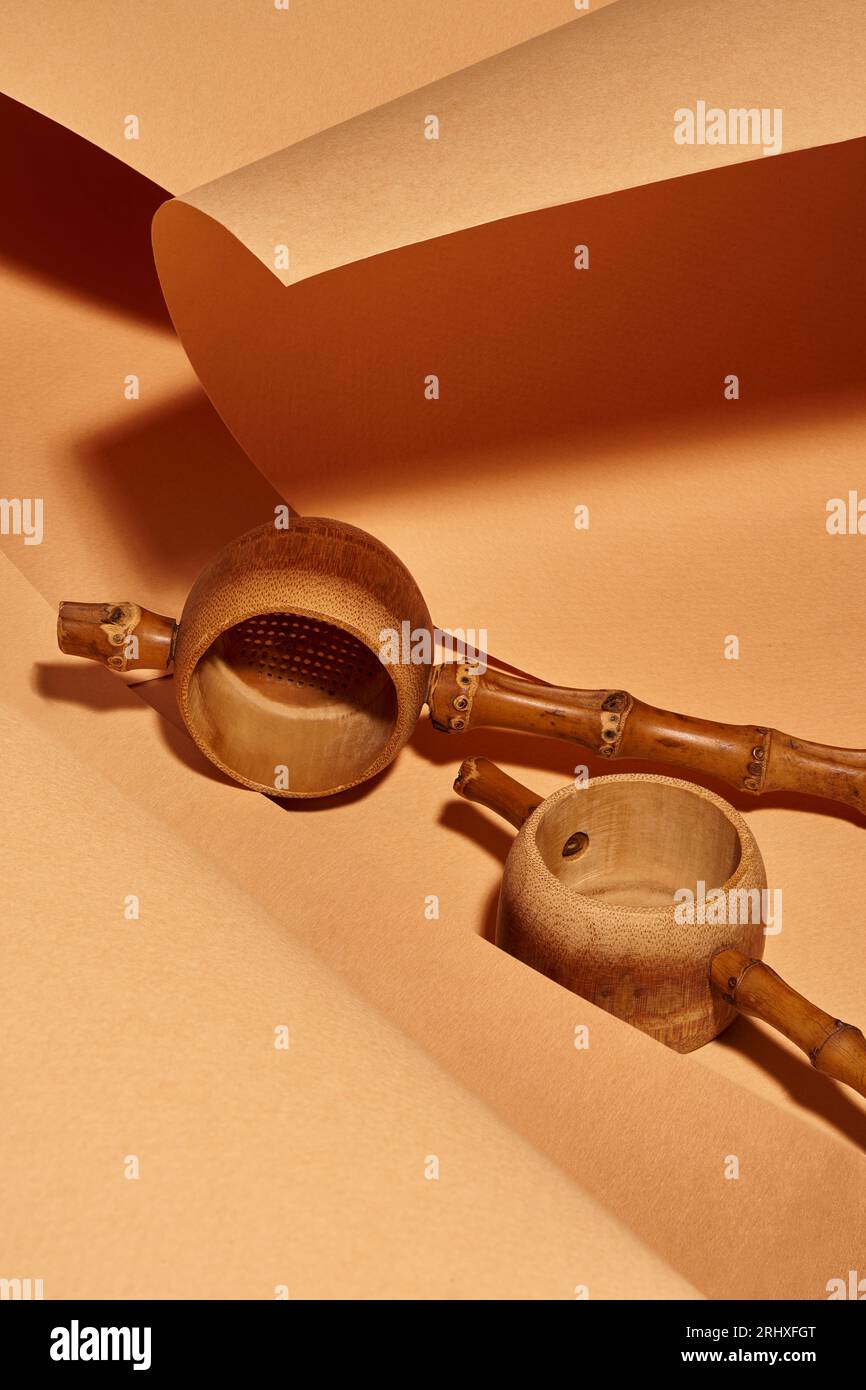 High angle of handmade bamboo tea filters on a craft paper background ...