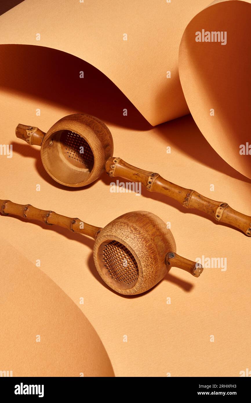 High angle of handmade bamboo tea filters on a craft paper background ...