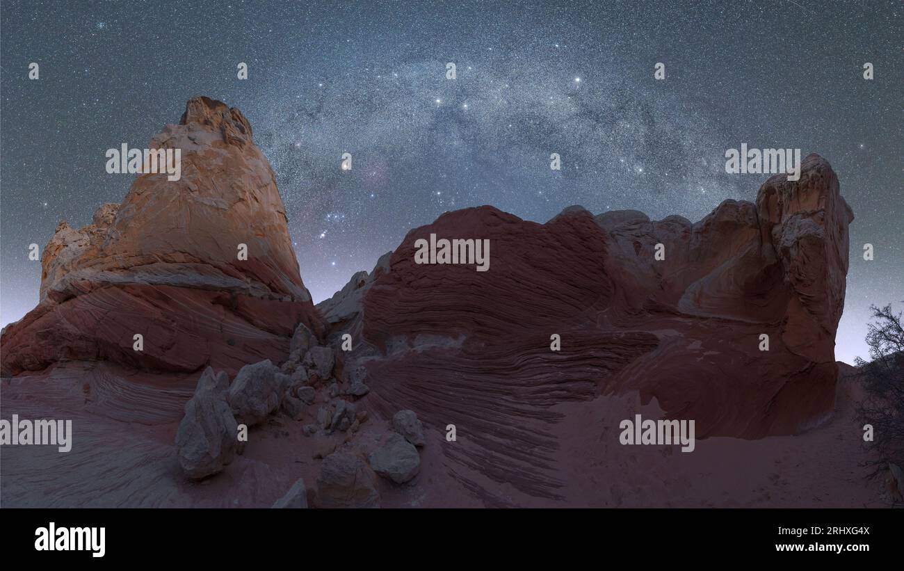 From below massive rocky formations in canyon under cloudless night ...