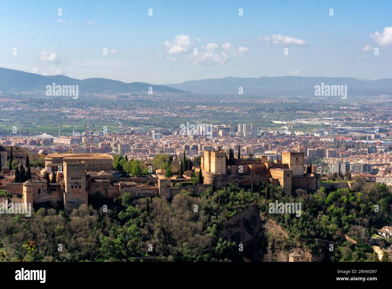 Wonderful aerial view of ancient buildings with tiled roofs in Granada ...