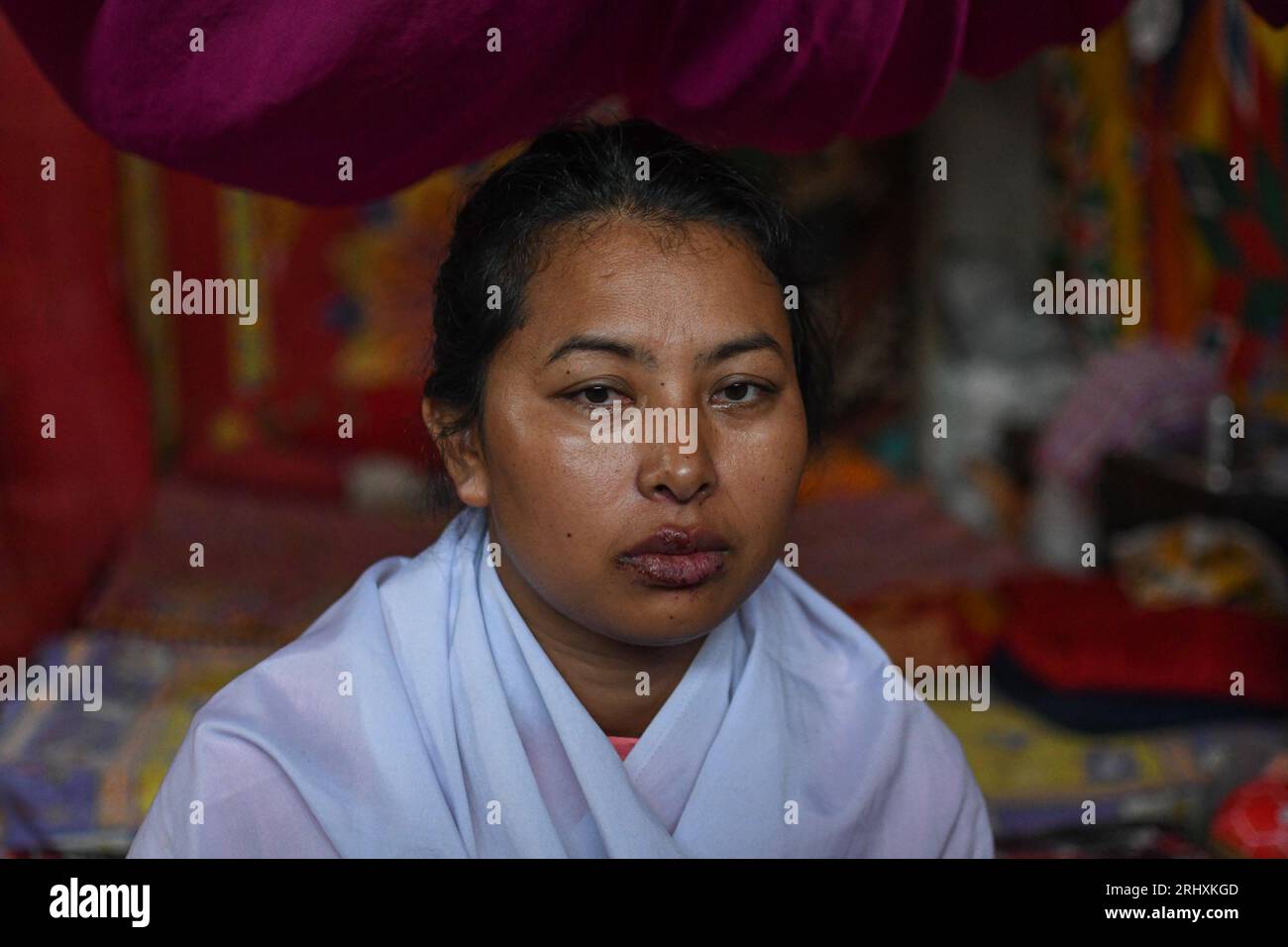 Imphal, Manipur, India. 10th Aug, 2023. Asha Leima, whose husband Yumnam Premkumar was killed ...