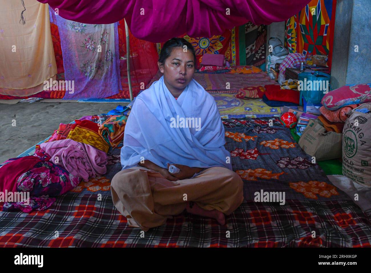 Imphal, Manipur, India. 10th Aug, 2023. Asha Leima, whose husband Yumnam Premkumar was killed ...