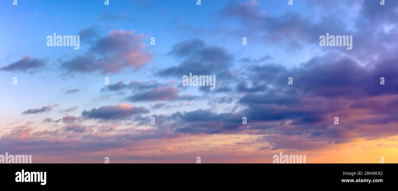 Real Sky panoramic background. Romantic pink clouds in the dawn sky ...