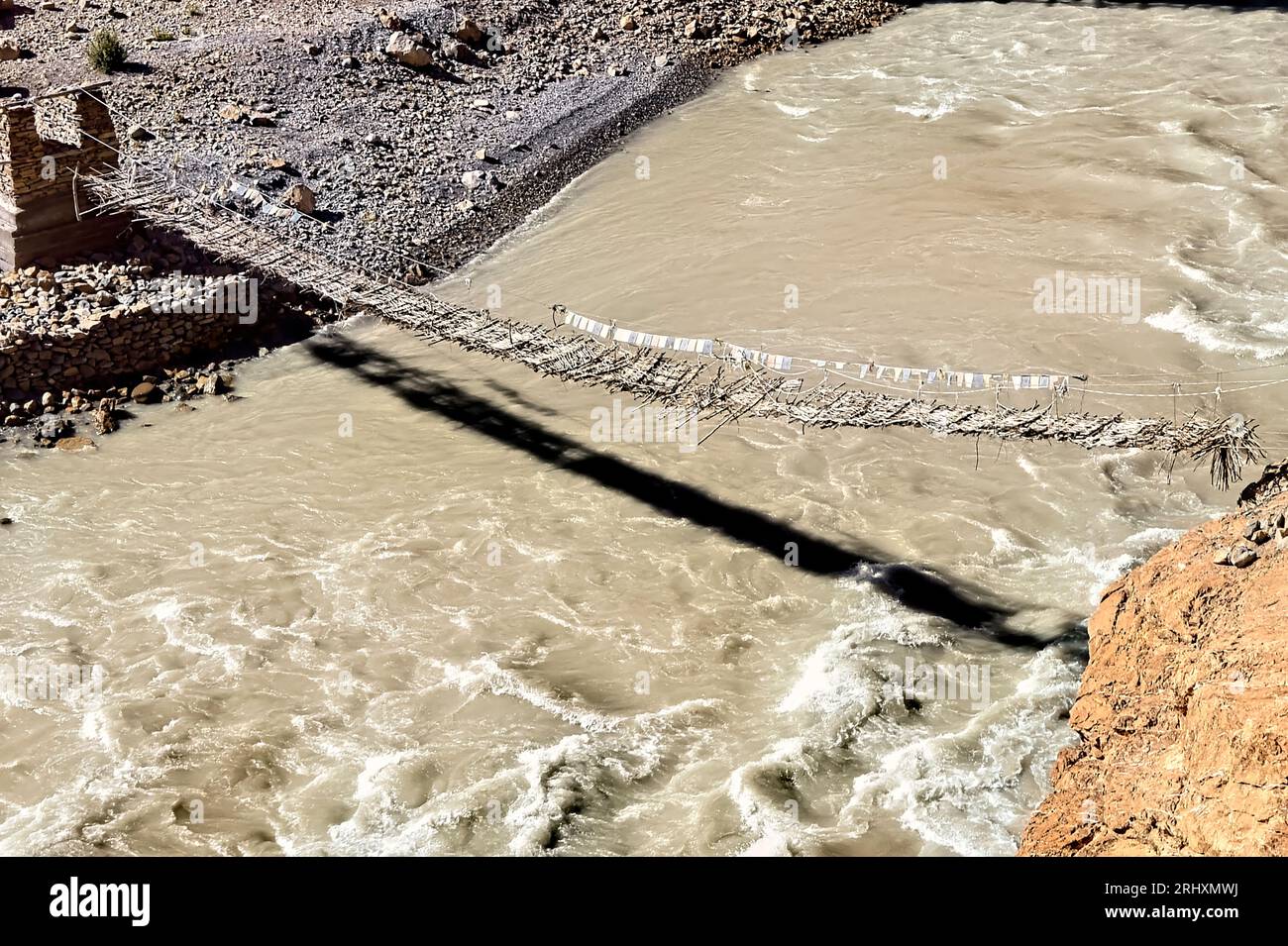 Traditional bridge across the Tsarab Chu River, Phugtal, (Phuktal ...