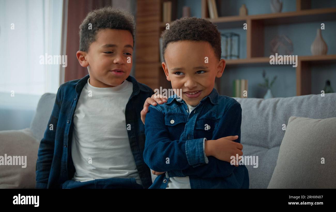 African American boy brother kid sorry apologize make peace after ...