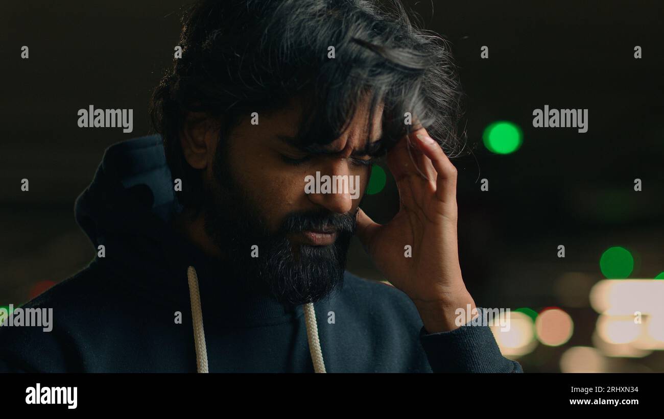 Close up stressed worried ill sick unhappy sad Arabian man touching ...