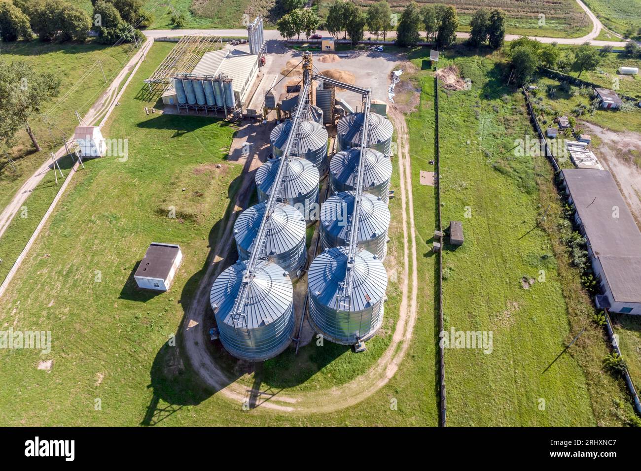 aerial panoramic view on agro-industrial complex with silos and grain ...