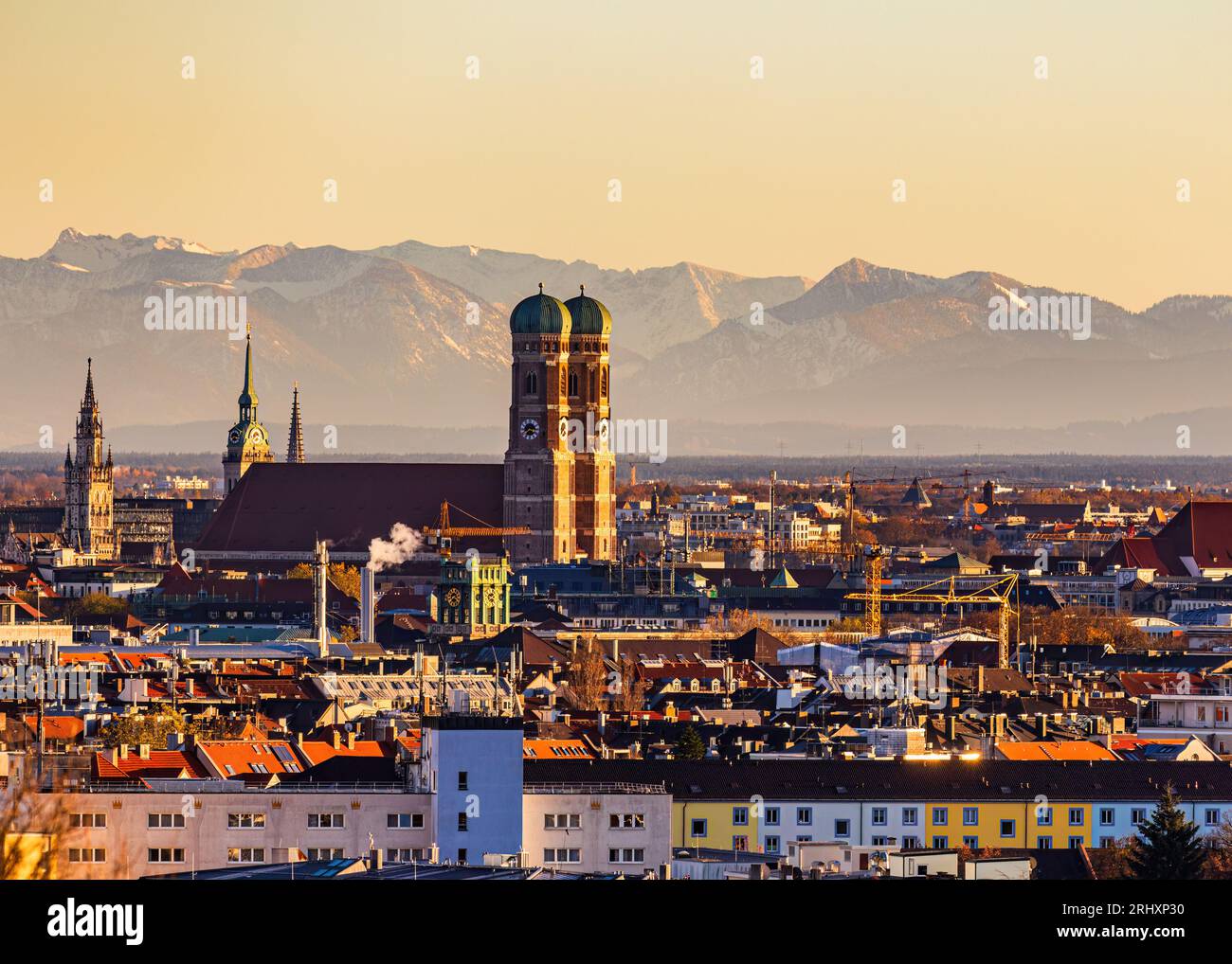 Famous Munich Skyline with Alps Stock Photo - Alamy