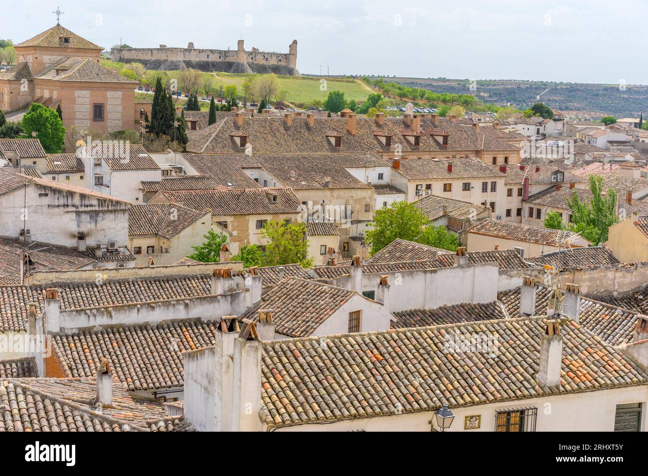 traditional homes, Spanish rooftops, local life in a historic plaza ...