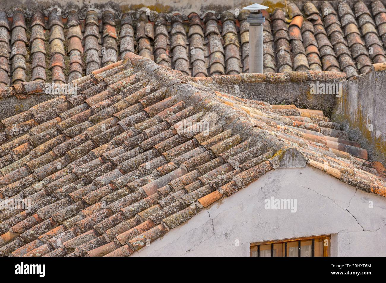 traditional homes, Spanish rooftops, local life in a historic plaza ...