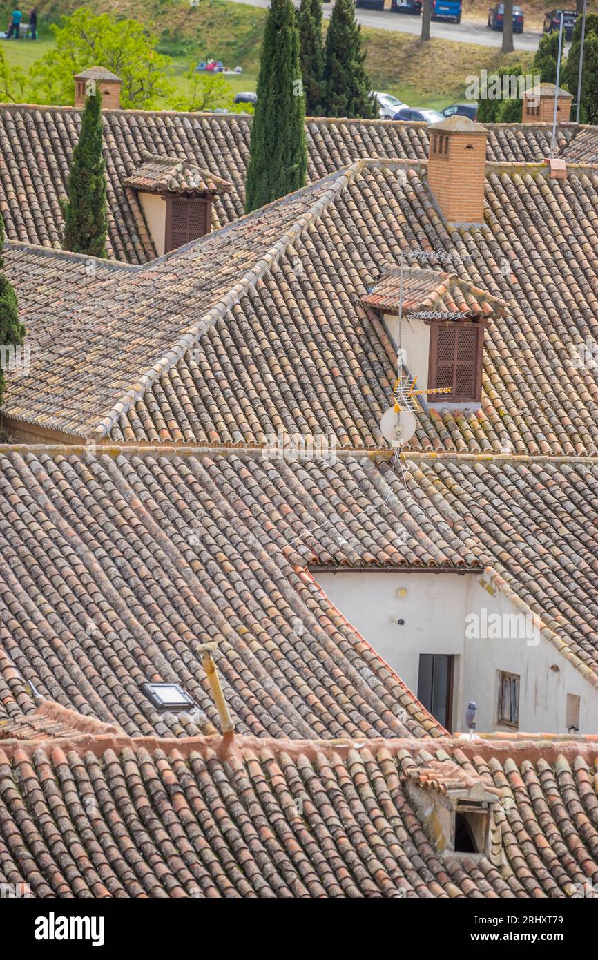 traditional homes, Spanish rooftops, local life in a historic plaza ...