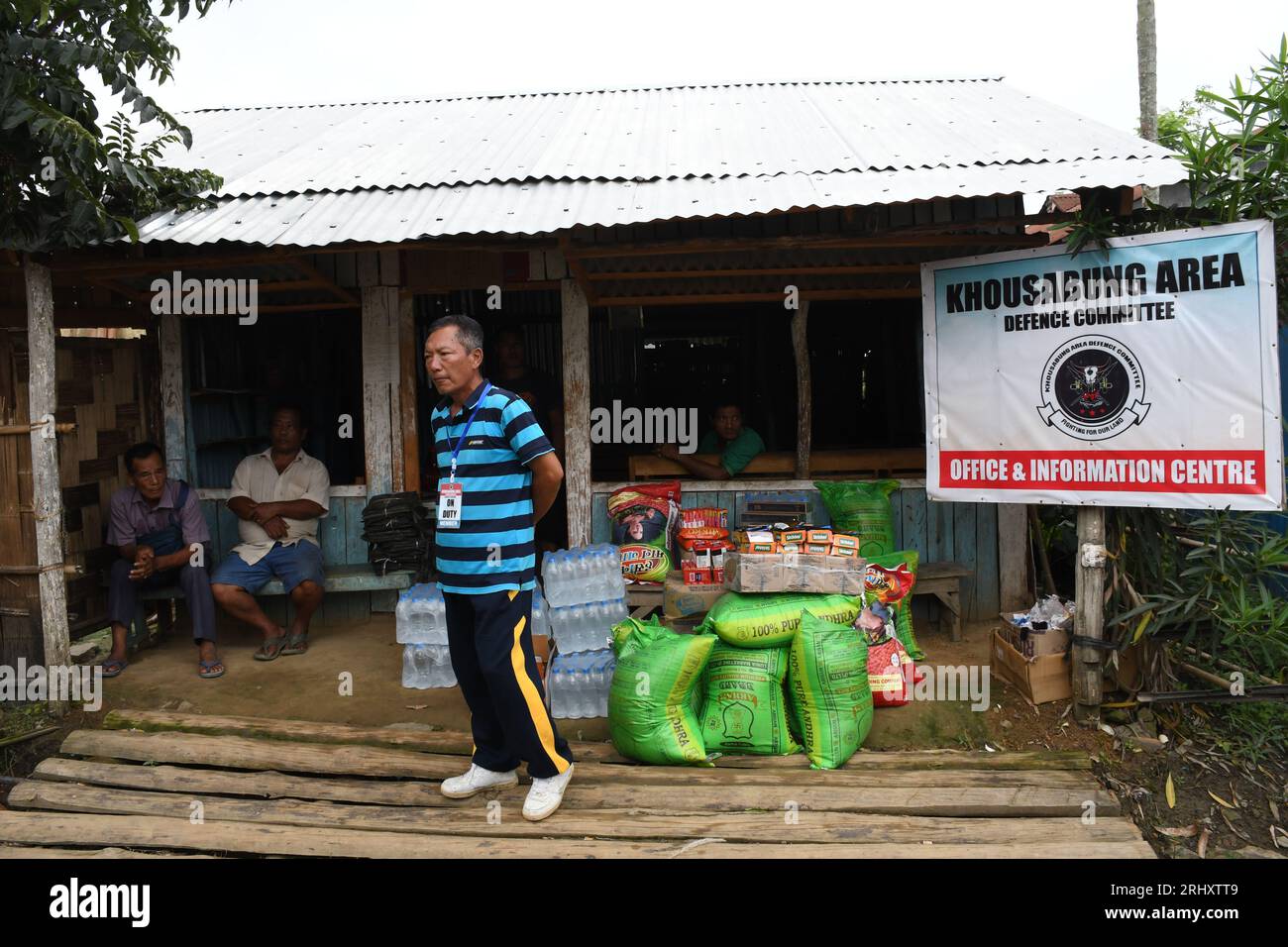 Churachandpur, India. 11th Aug, 2023. A Kuki village headman stands in ...