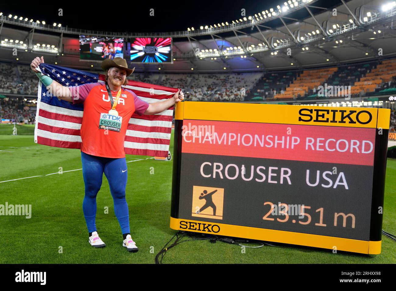 Ryan Crouser, of the United States, poses after winning the gold medal ...
