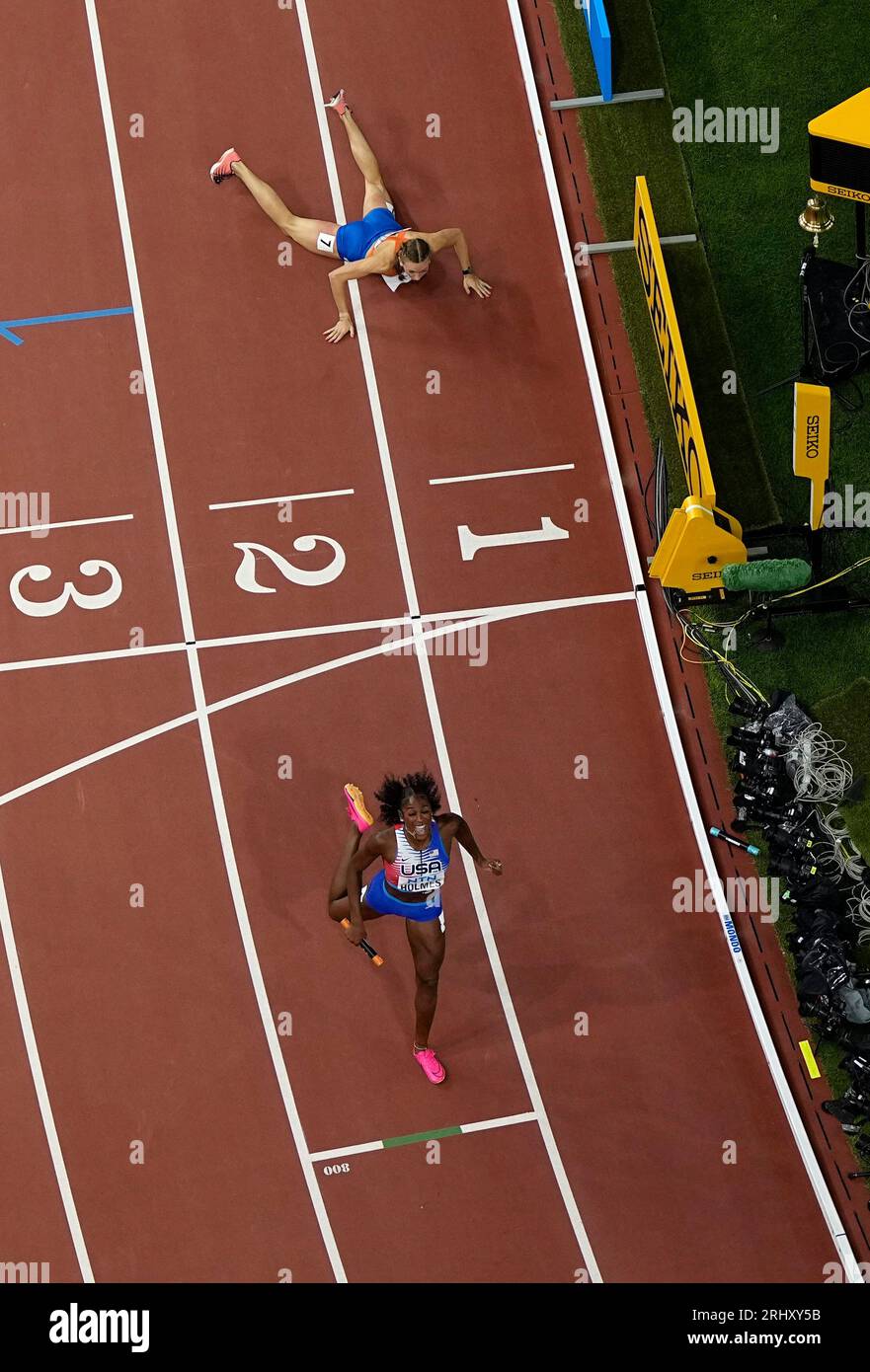 Alexis Holmes, bottom, of the United States celebrates after she ...