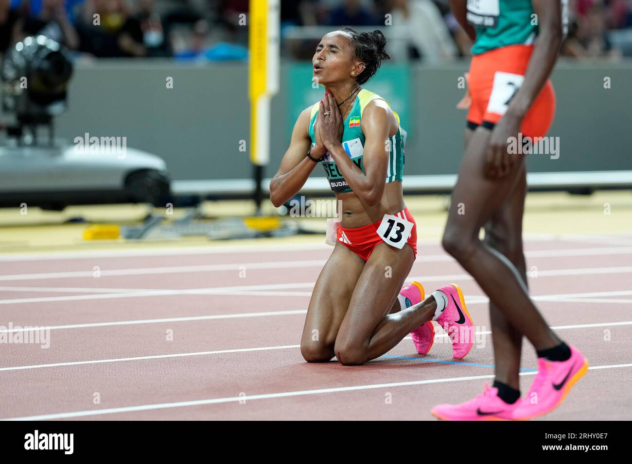 Gudaf Tsegay, of Ethiopia, reacts after winning the gold medal in the ...
