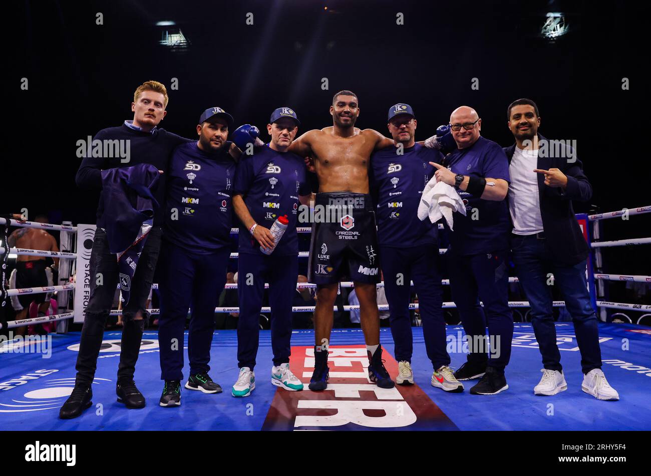 Solomon Dacres poses with his team following victory against Chris ...