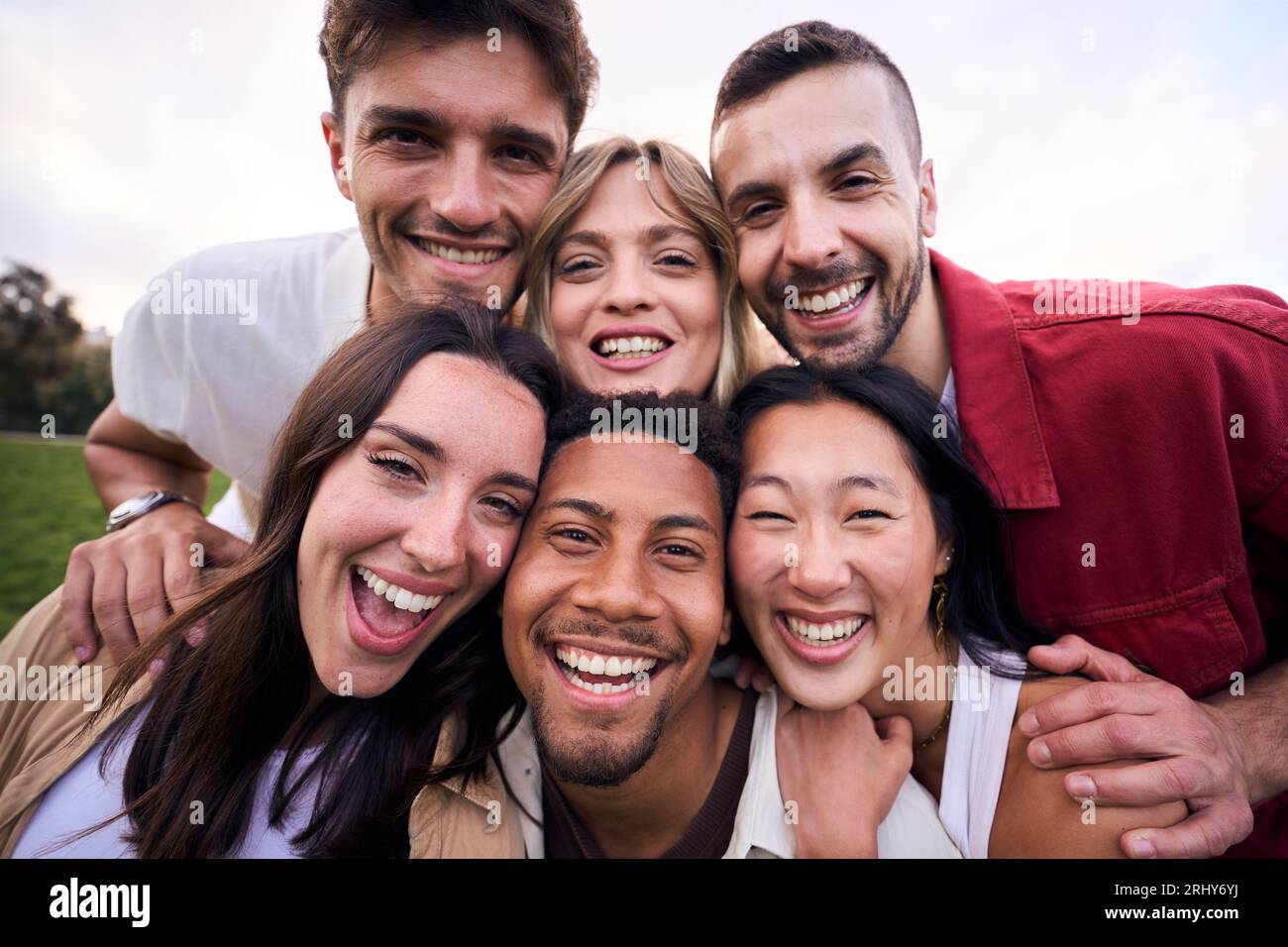 Group of happy multirracial friends having fun outdoors at the park ...