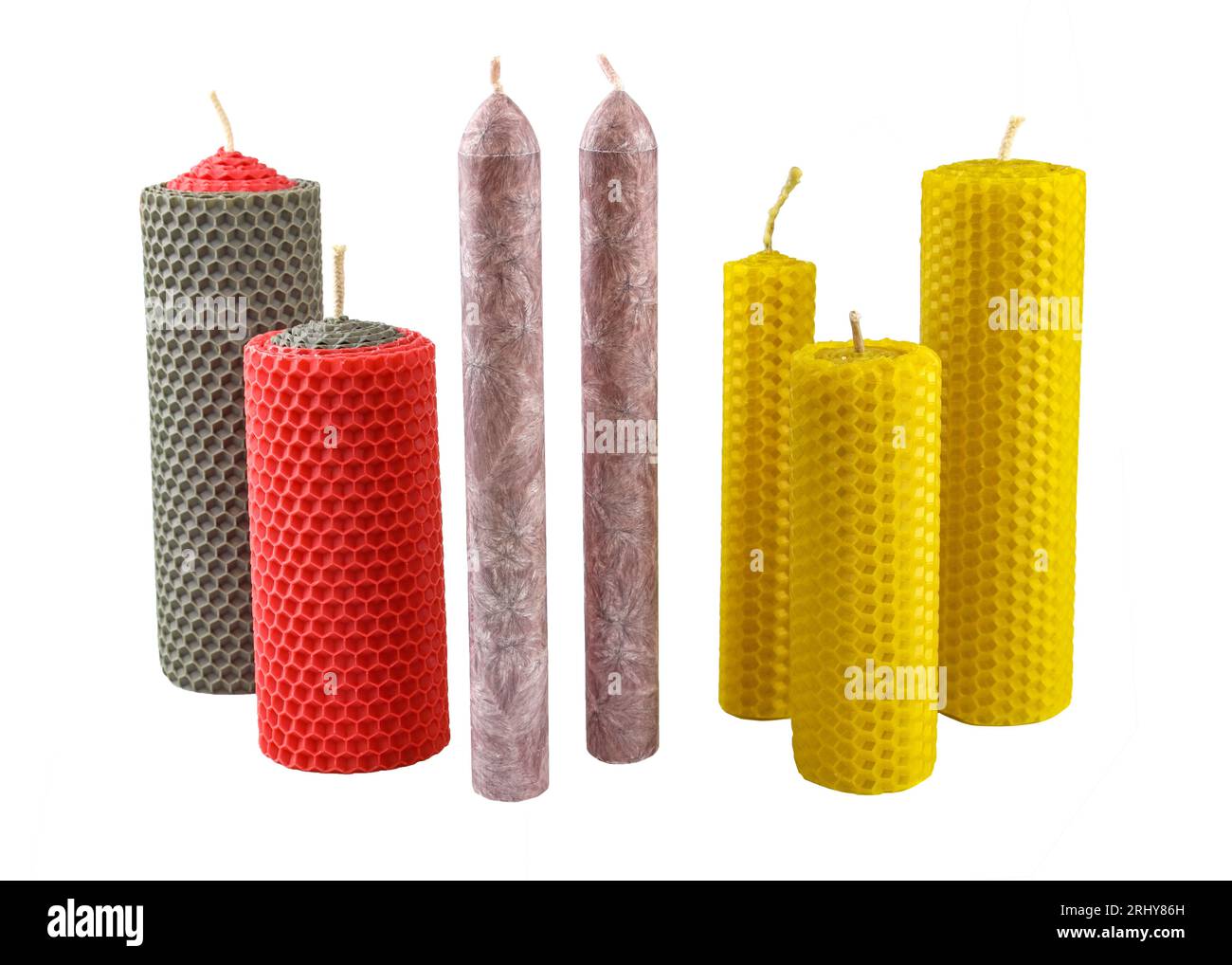Different types and shapes of candles on a white background. Natural ...