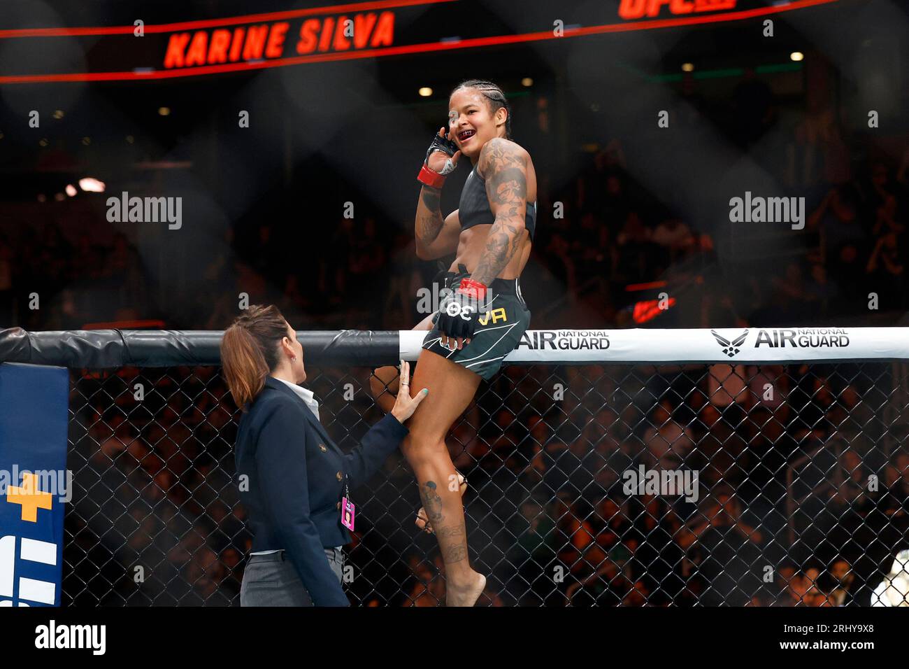 Karine Silva celebrates a win against Maryna Munoz during a UFC 292 ...
