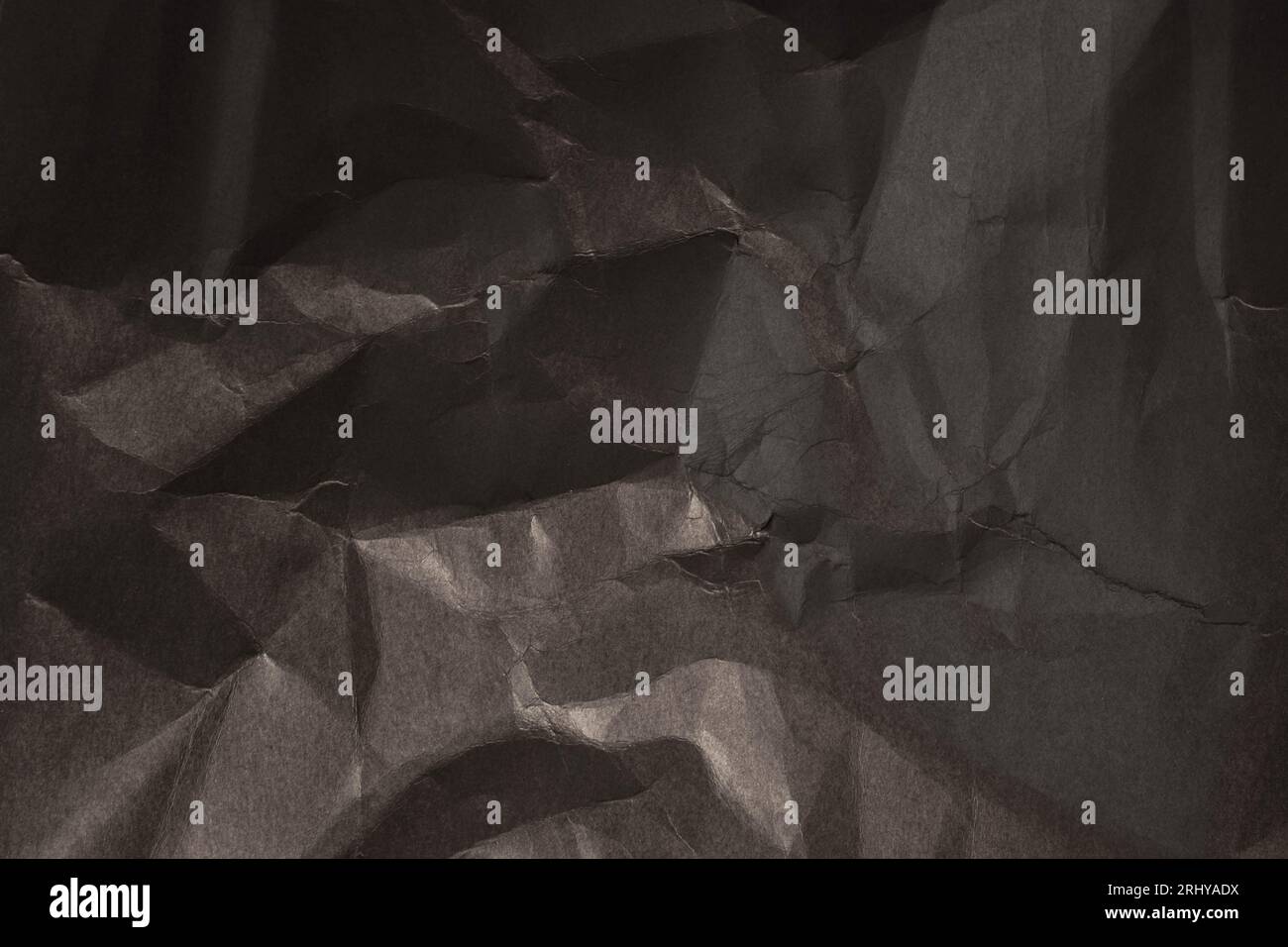 Black crumpled paper texture or background Stock Photo - Alamy