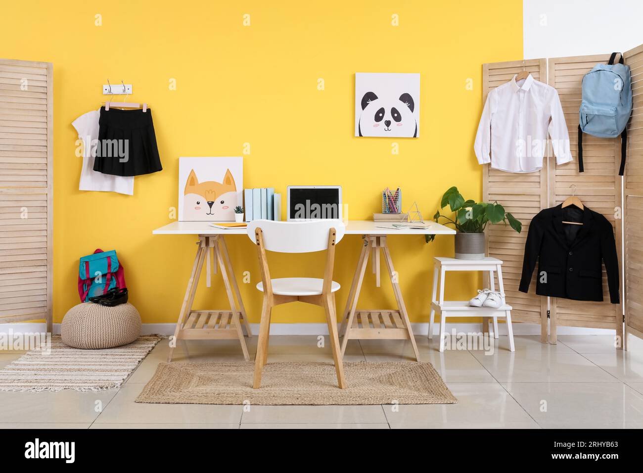 Interior of modern room with workplace and stylish school uniform Stock ...