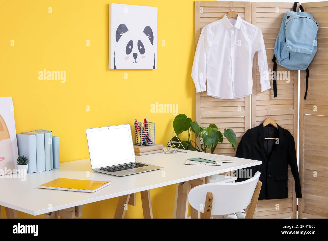 Interior of modern room with workplace and stylish school uniform Stock ...