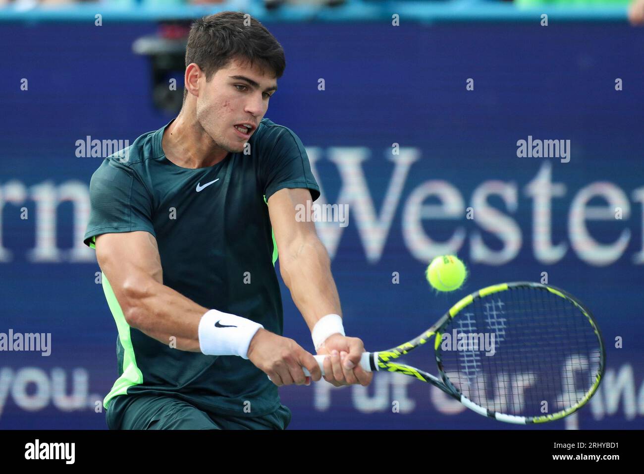 CINCINNATI, OH - AUGUST 19: Carlos Alcaraz of Spain hits a backhand ...
