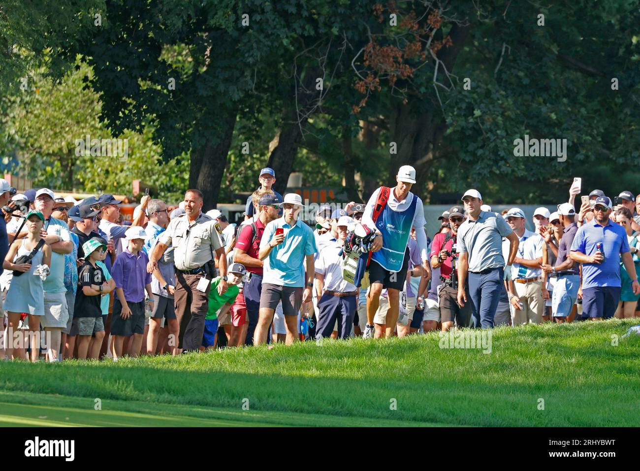 OLYMPIA FIELDS, IL - AUGUST 19: PGA golfer Scottie Scheffler hits out of the rough on the 18th ...