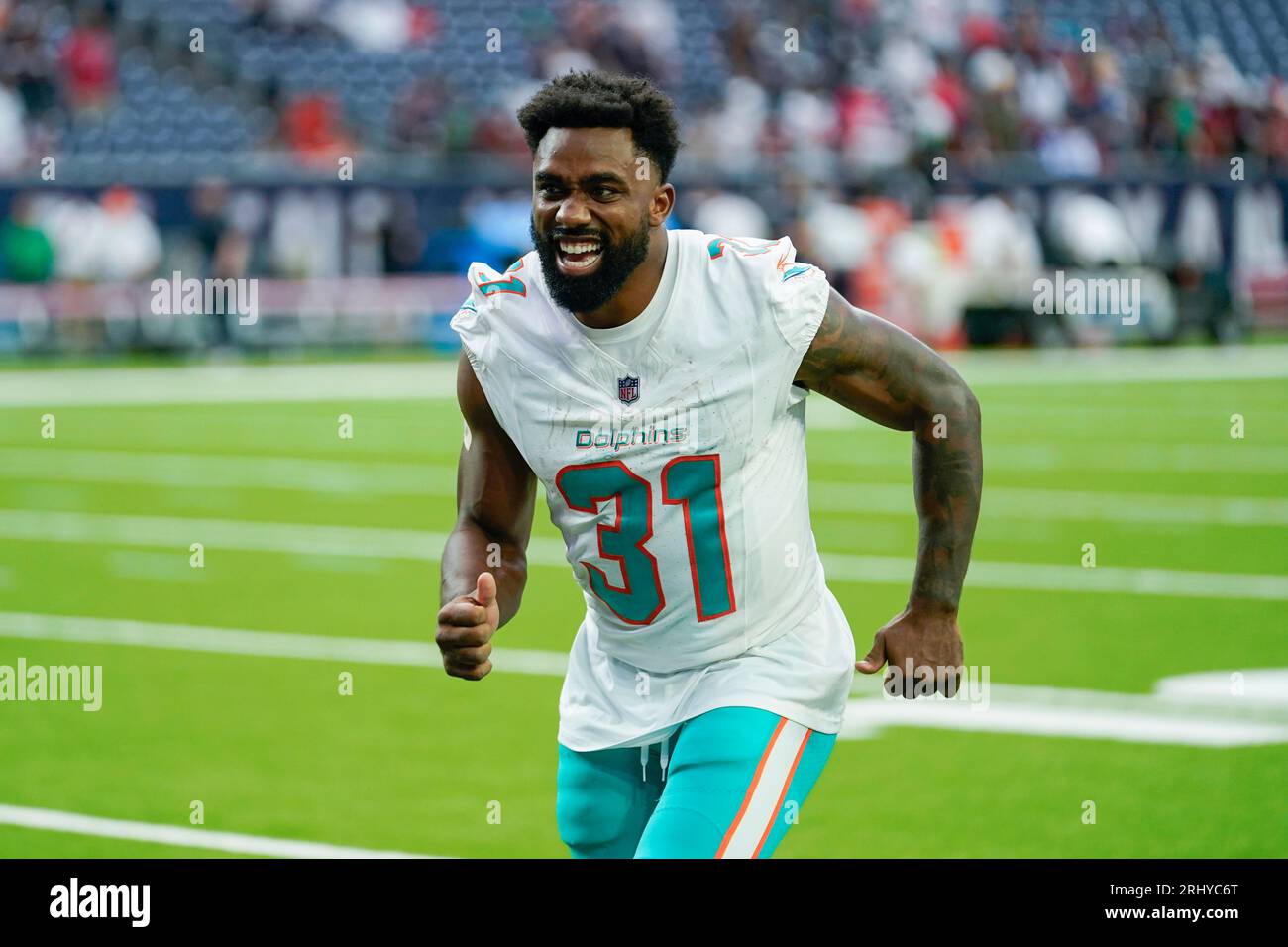 Miami Dolphins running back Raheem Mostert leaves the field following ...