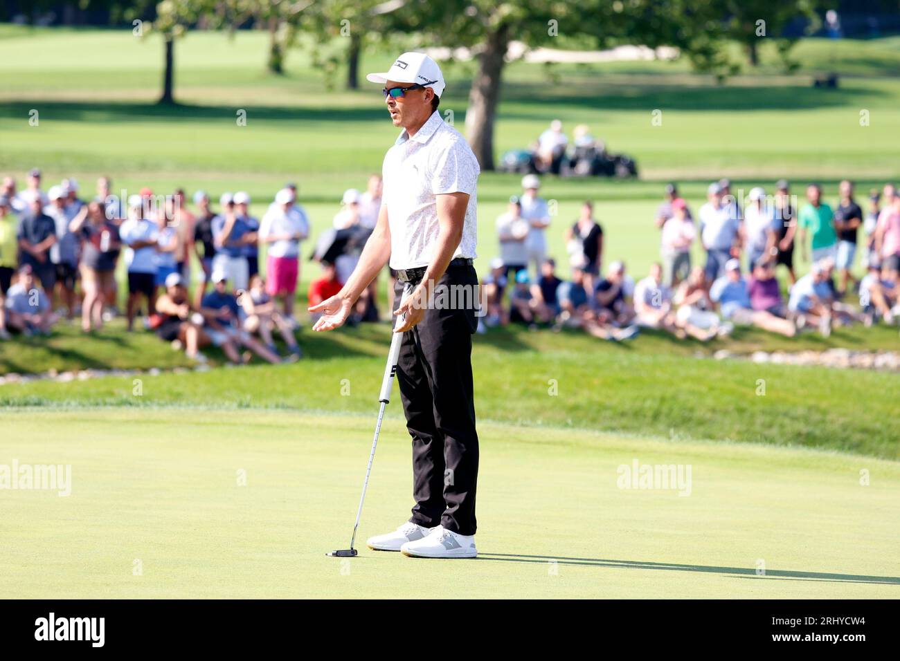 OLYMPIA FIELDS, IL - AUGUST 19: PGA golfer Rickie Fowler reacts to missing a birdie putt on the ...
