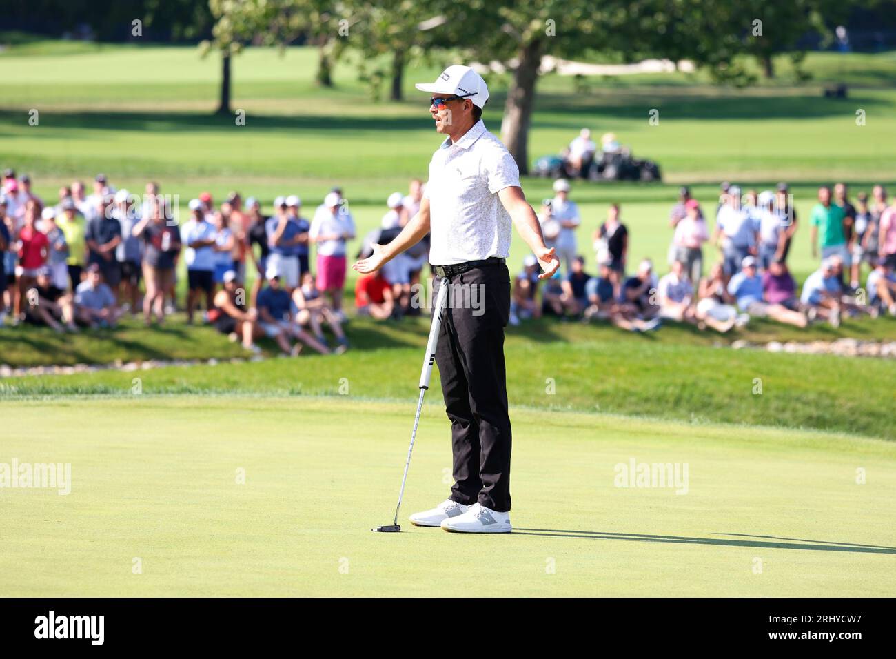 OLYMPIA FIELDS, IL - AUGUST 19: PGA golfer Rickie Fowler reacts to missing a birdie putt on the ...