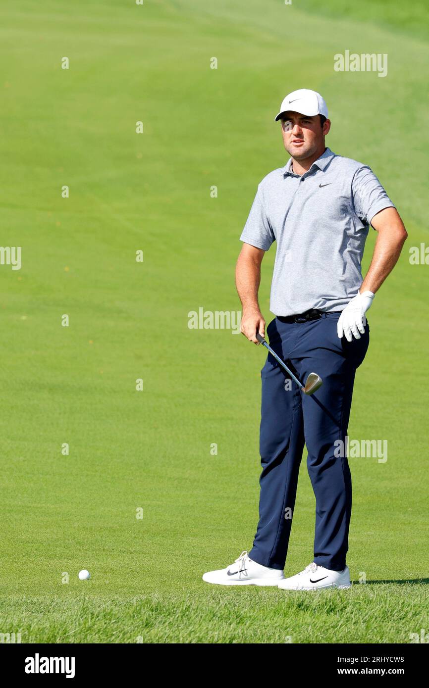 OLYMPIA FIELDS, IL - AUGUST 19: PGA golfer Scottie Scheffler plays his 3rd shot on the 18th hole ...