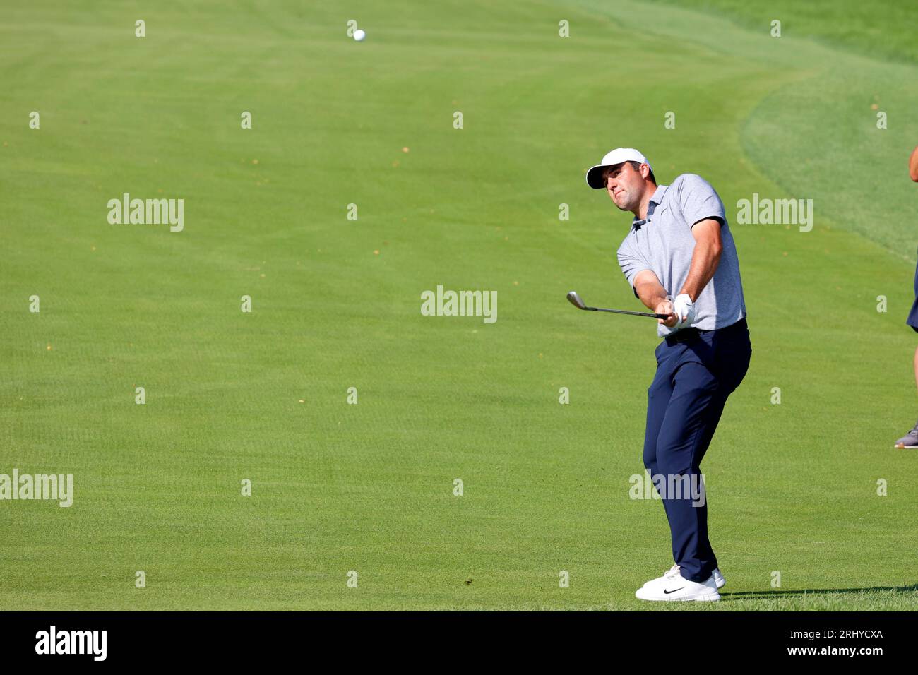OLYMPIA FIELDS, IL - AUGUST 19: PGA golfer Scottie Scheffler plays his 3rd shot on the 18th hole ...