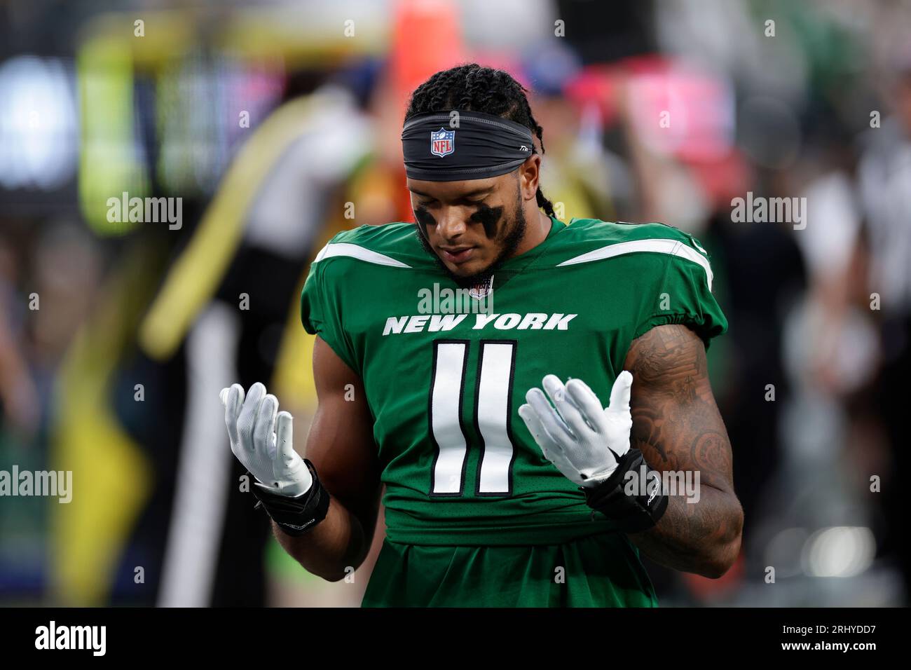 New York Jets linebacker Jermaine Johnson (11) pauses before a ...
