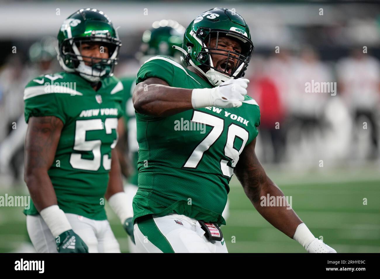 New York Jets defensive tackle Tanzel Smart (79) reacts after tackling ...