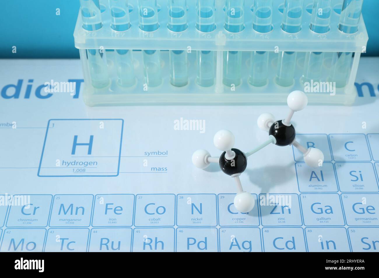 Molecular model and test tubes on periodic table Stock Photo - Alamy