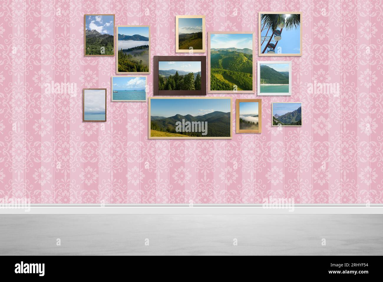 Many beautiful landscapes in frames on striped wall in room Stock Photo ...