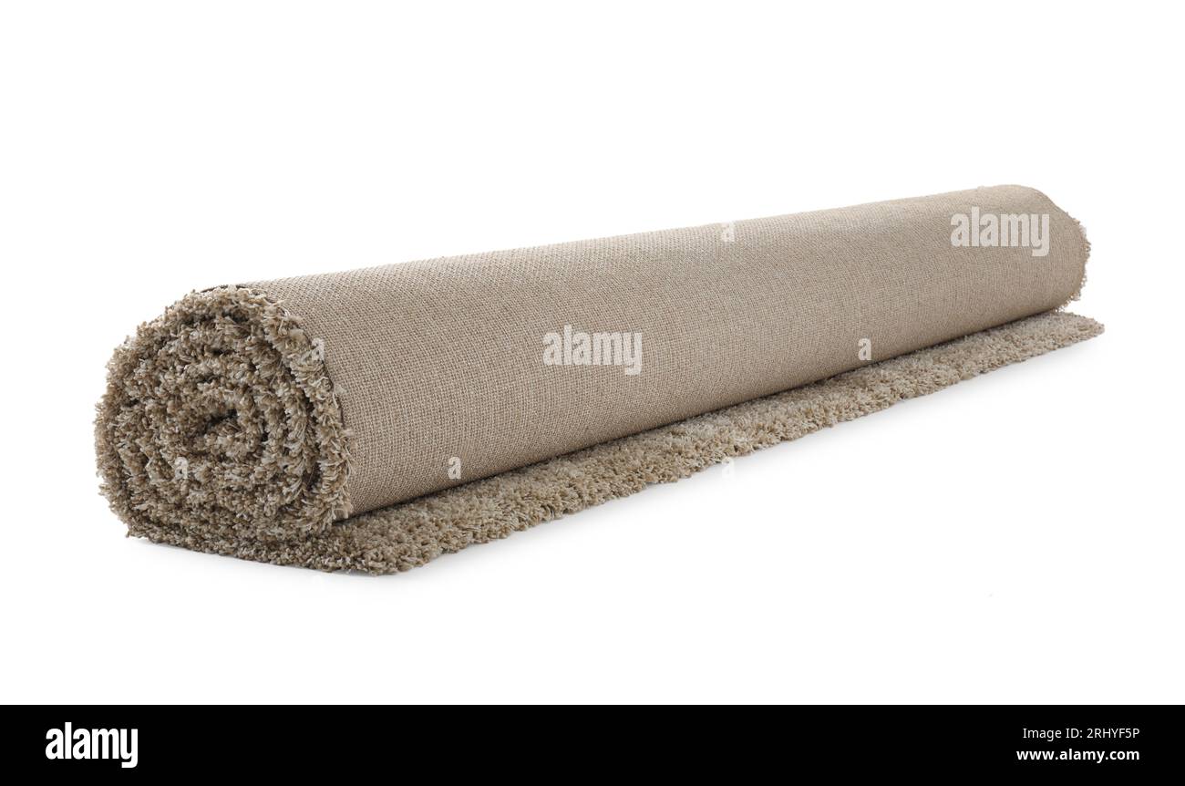 Rolled fuzzy carpet on white background. Interior element Stock Photo ...