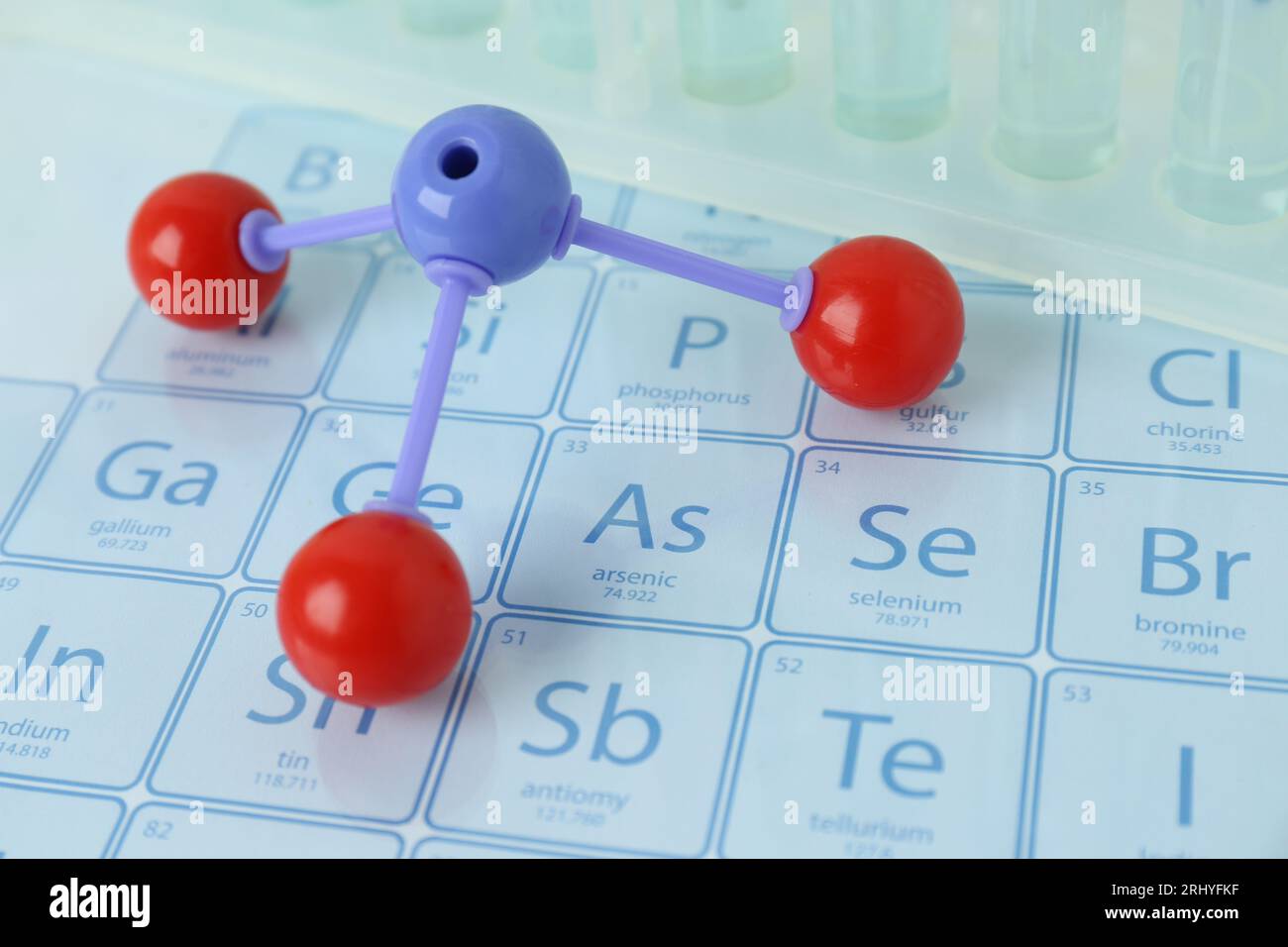 Molecular model and test tubes on periodic table Stock Photo - Alamy
