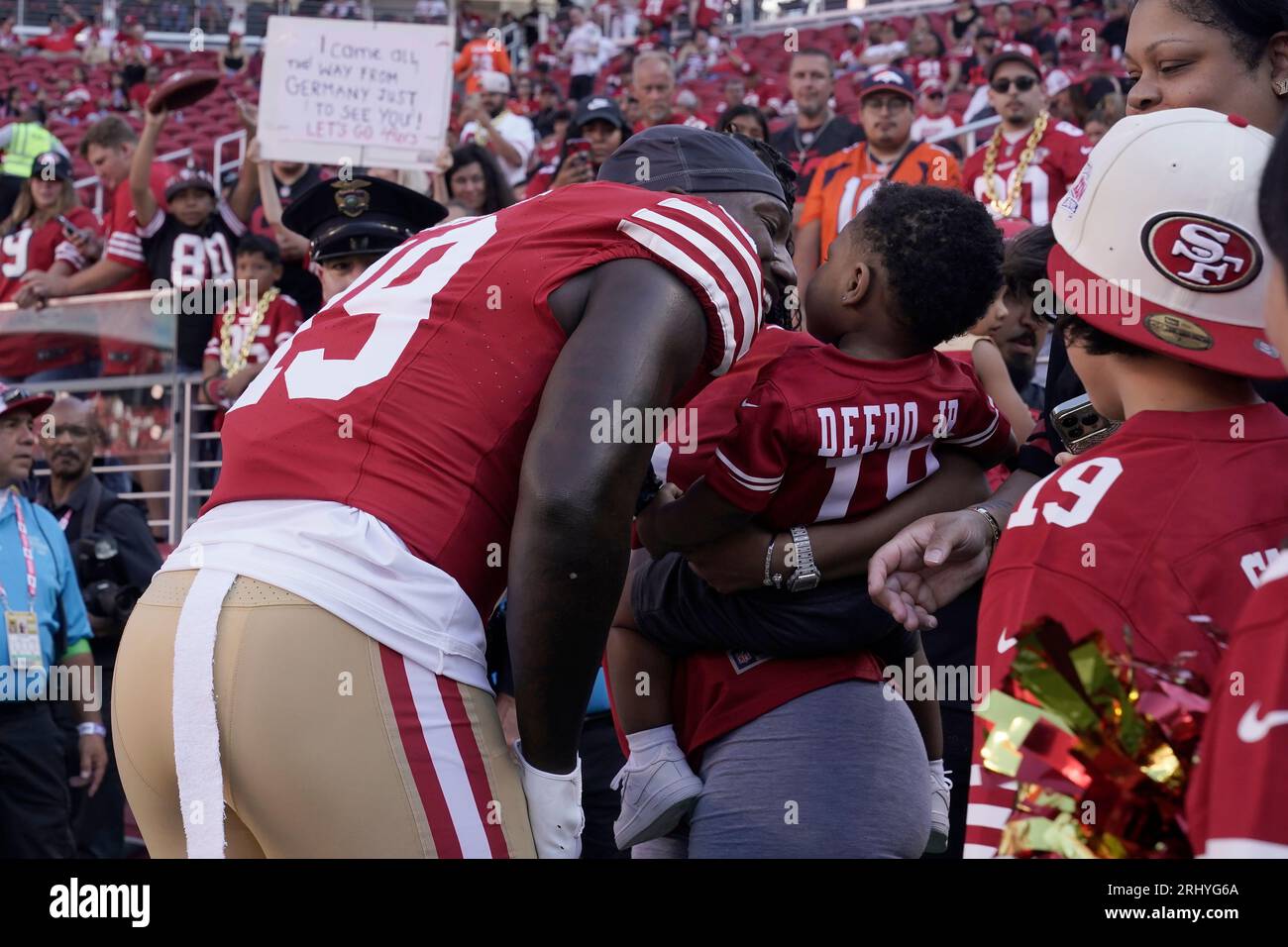 San Francisco 49ers wide receiver Deebo Samuel (19) greets his child ...