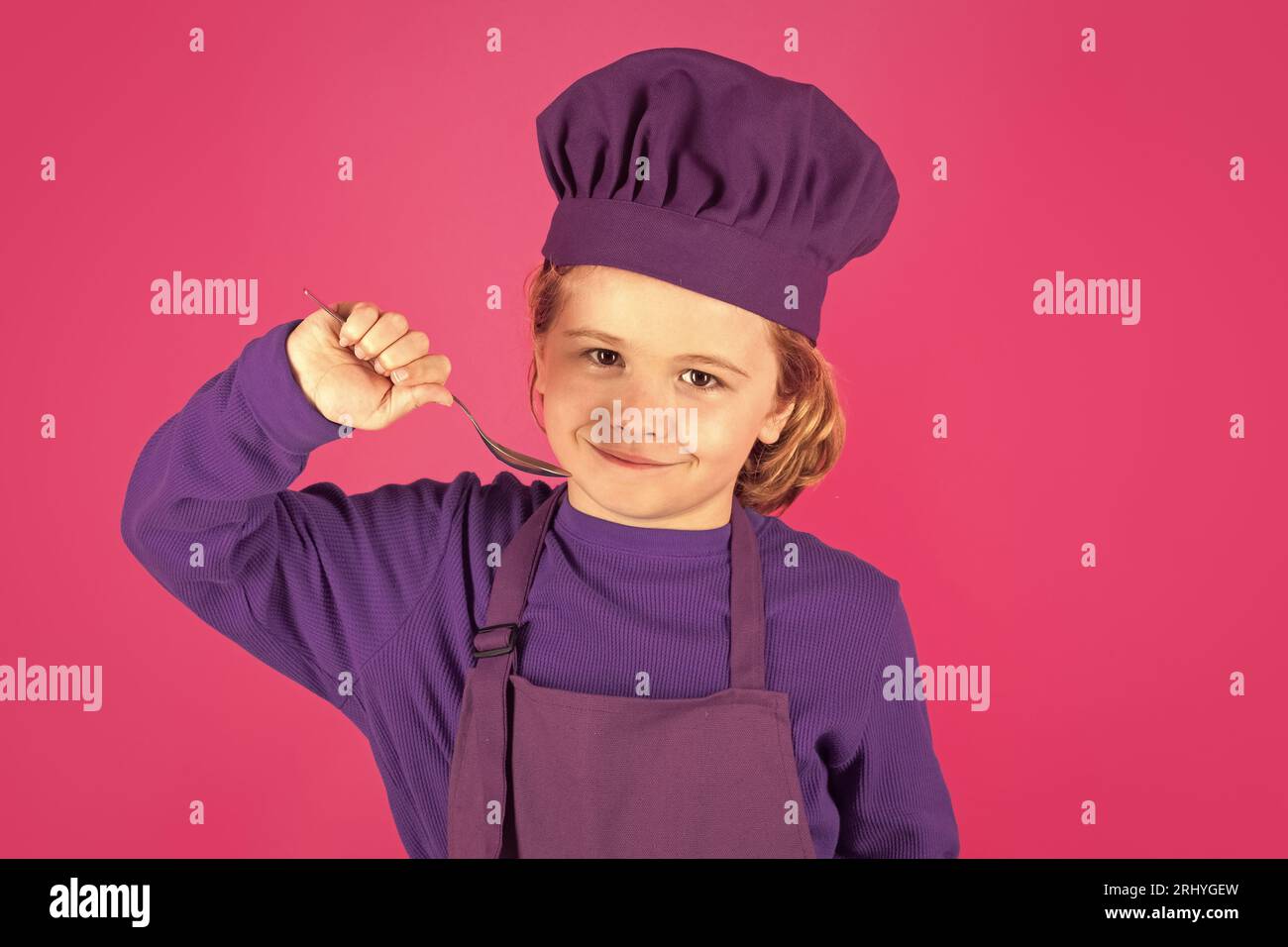 Funny kid chef cook with spoon. Kid chef cook, studio portrait ...